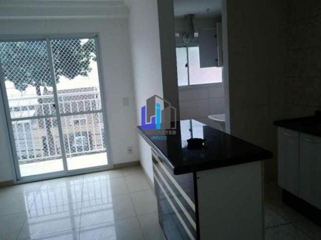 Apartamento com 2 dormitórios, 1 vaga, na Vila Alzira
