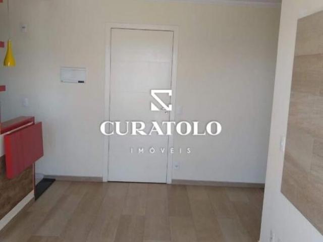 Apartamento com 2 dormitórios, varanda e 1 vaga Vila Homero Thon, Santo André