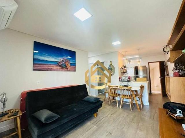 Apartamento com 2 dormitórios à venda por R$ 460.000,00 Praia das Pitangueiras Guarujá/SP
