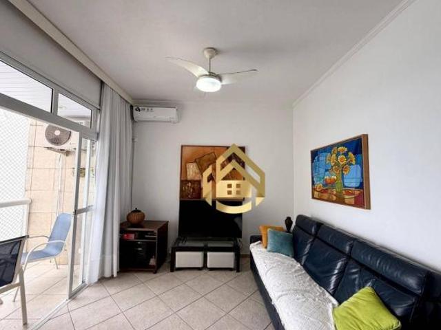 Apartamento com 2 dormitórios à venda por R$ 600.000,00 Praia das Pitangueiras Frente Mar Guaruj