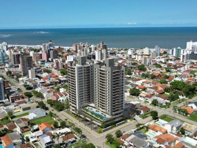 Apartamento com 2 dormitórios à venda por R$ 716.616,82 Centro Guaratuba/PR