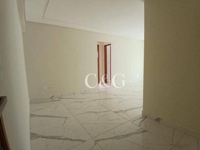 Apartamento com 2 dormitórios à venda, Prédio Frente Mar por R$ 450.000 Real Praia Grande/SP