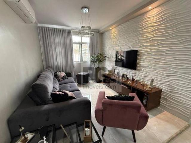Apartamento com 2 dormitórios à venda, 102 m² por R$ 800.000,00 Ponta da Praia Santos/SP
