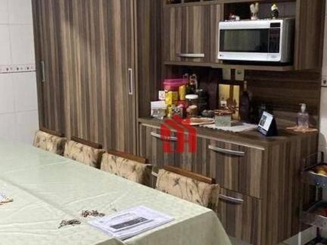 Apartamento com 2 dormitórios à venda, 110 m² por R$ 680.000,00 Ponta da Praia Santos/SP