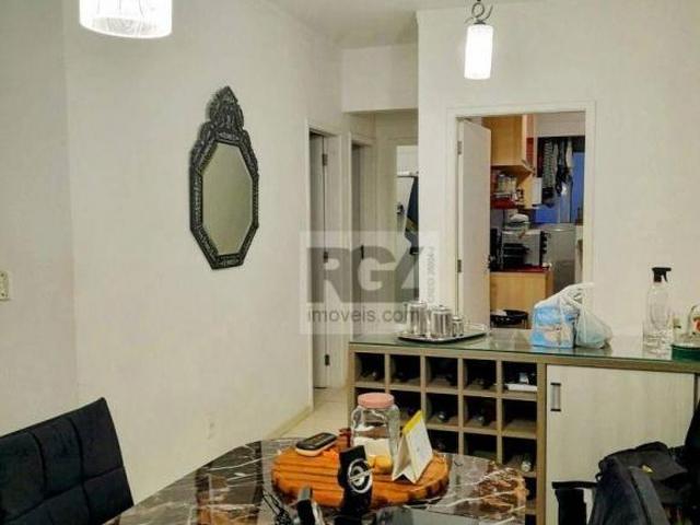 Apartamento com 2 dormitórios à venda, 115 m² por R$ 721.000,00 Embaré Santos/SP