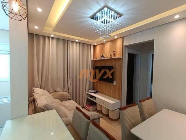 Apartamento com 2 dormitórios à venda, 45 m² por R$ 299.000,00 Areia Branca Santos/SP