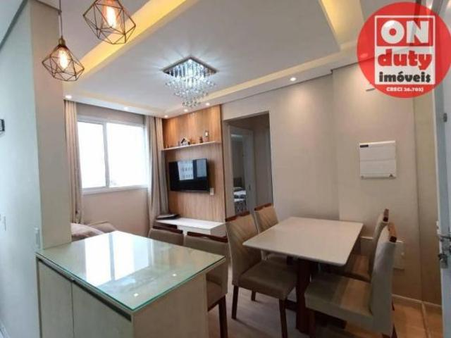 Apartamento com 2 dormitórios à venda, 46 m² por R$ 295.000,00 Areia Branca Santos/SP