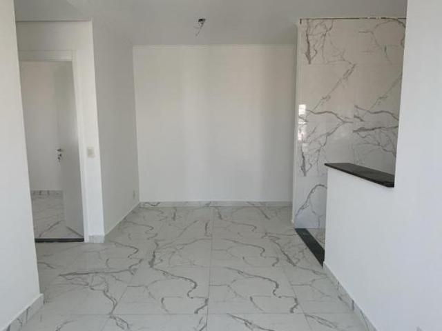 Apartamento com 2 dormitórios à venda, 47 m² por R$ 366.000,00 Ocian Praia Grande/SP