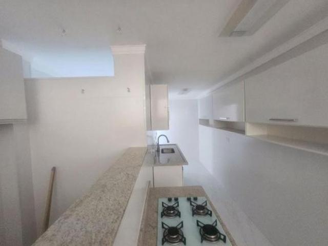 Apartamento com 2 dormitórios à venda, 47 m² por R$ 915.000,00 Aparecida Santos/SP
