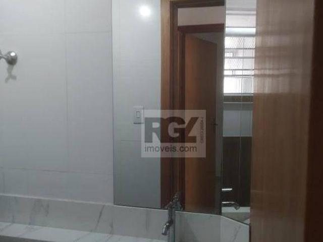 Apartamento com 2 dormitórios à venda, 48 m² por R$ 310.000,00 Aparecida Santos/SP