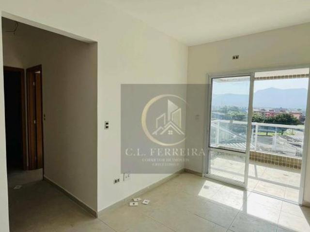 Apartamento com 2 dormitórios à venda, 54 m² por R$ 382.000,00 Mirim Praia Grande/SP