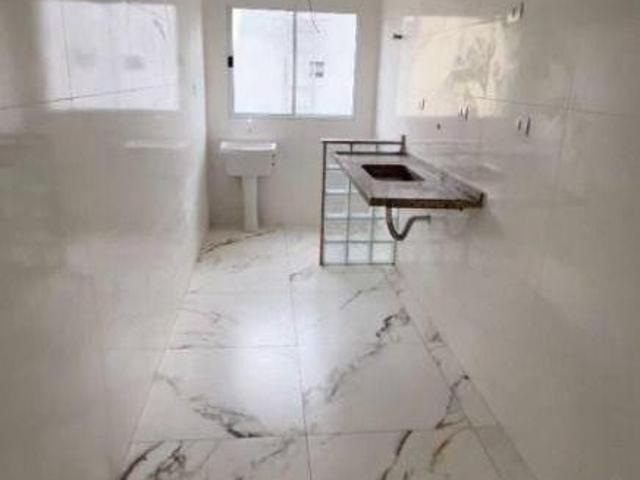 Apartamento com 2 dormitórios à venda, 55 m² por R$ 220.000,00 Centro São Vicente/SP