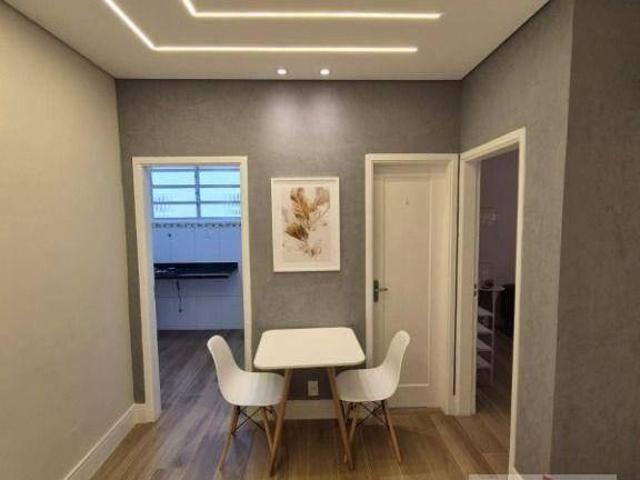 Apartamento com 2 dormitórios à venda, 55 m² por R$ 477.000,00 Boqueirão Santos/SP