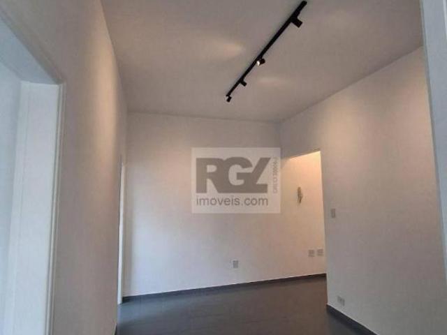 Apartamento com 2 dormitórios à venda, 56 m² por R$ 275.000,00 Centro São Vicente/SP