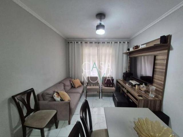 Apartamento com 2 dormitórios à venda, 56 m² por R$ 375.000,00 Aparecida Santos/SP