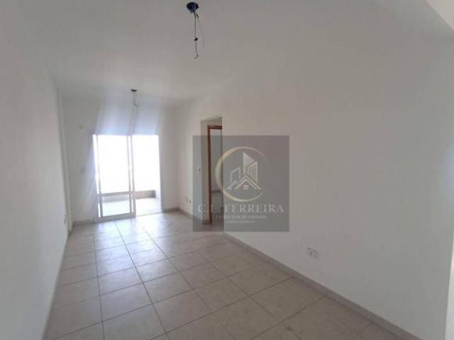 Apartamento com 2 dormitórios à venda, 56 m² por R$ 404.000,00 Mirim Praia Grande/SP