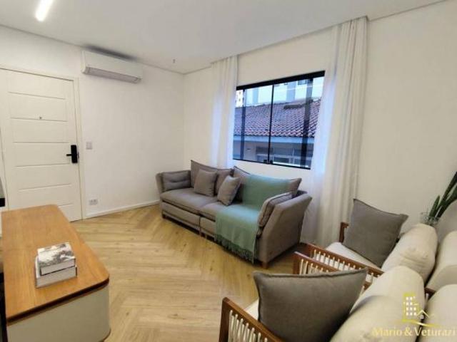 Apartamento com 2 dormitórios à venda, 56 m² por R$ 450.000,00 Astúrias Guarujá/SP