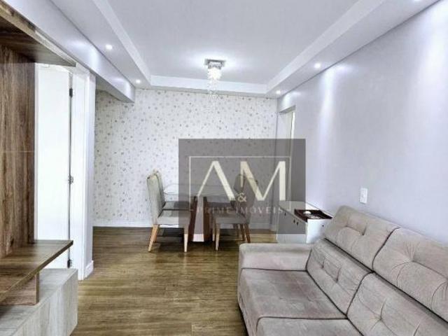 Apartamento com 2 dormitórios à venda, 56 m² por R$ 597.890
