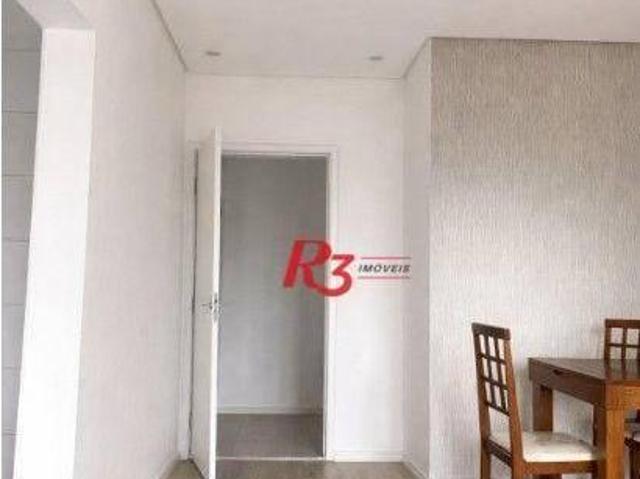 Apartamento com 2 dormitórios à venda, 57 m² por R$ 335.000,00 Areia Branca Santos/SP