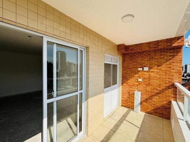Apartamento com 2 dormitórios à venda, 57 m² por R$ 450.000,00 Canto do Forte Praia Grande/SP