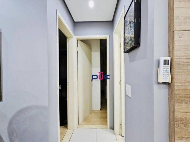 Apartamento com 2 dormitórios à venda, 59 m² por R$ 320.000,00 Morro de Nova Cintra Santos/SP