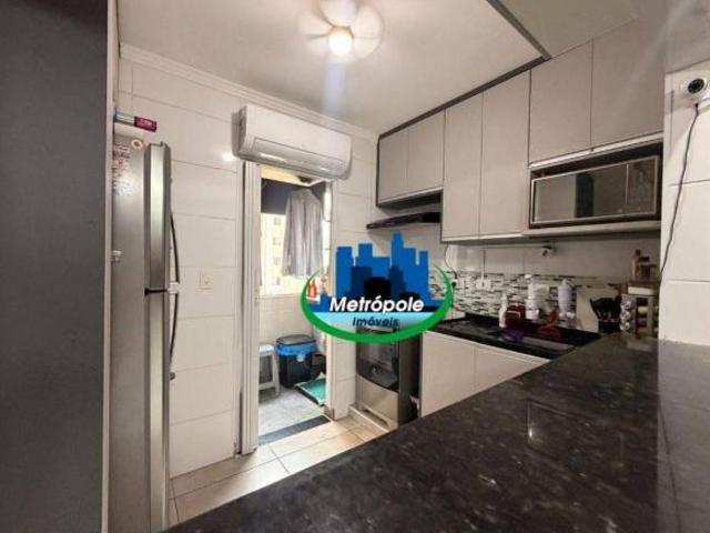 Apartamento com 2 dormitórios à venda, 52 m² por R$ 325.000,00 Macedo Guarul