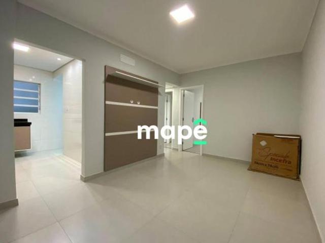 Apartamento com 2 dormitórios à venda, 64 m² por R$ 600.000,00 Ponta da Praia Santos/SP