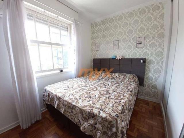 Apartamento com 2 dormitórios à venda, 65 m² por R$ 390.000,00 Aparecida Santos/SP