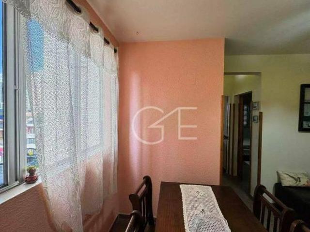 Apartamento com 2 dormitórios à venda, 65 m² por R$ 460.000,00 Ponta da Praia Santos/SP
