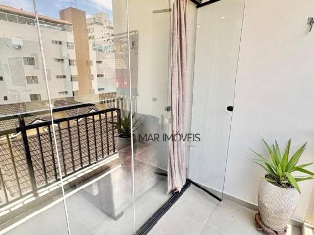 Apartamento com 2 dormitórios à venda, 65 m² por R$ 630.000,00 Praia do Tombo Guarujá/SP