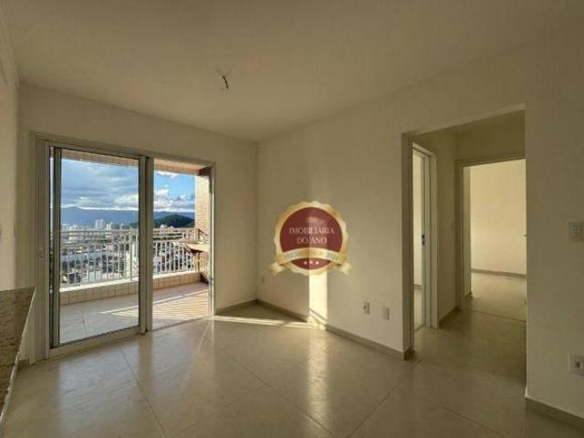 Apartamento com 2 dormitórios à venda, 65 m² por R$ 650.000,00 Canto do Forte Praia Grande/SP