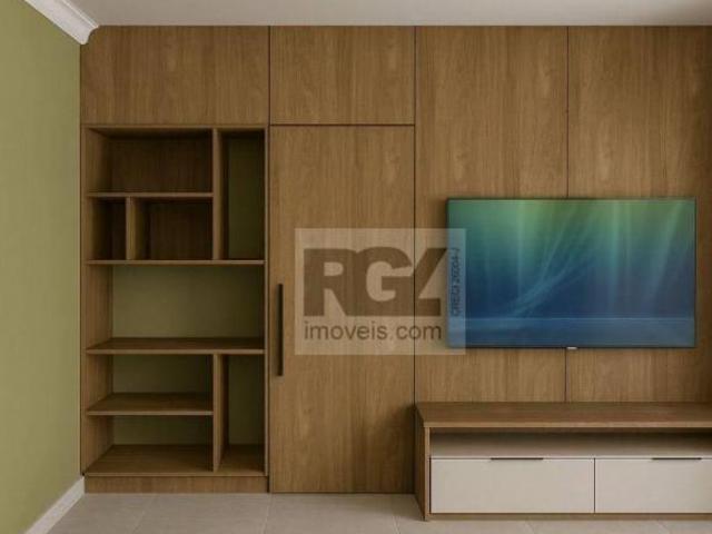 Apartamento com 2 dormitórios à venda, 65 m² por R$ 850.000,00 Ponta da Praia Santos/SP