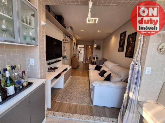 Apartamento com 2 dormitórios à venda, 66 m² por R$ 930.000,00 Campo Grande Santos/SP