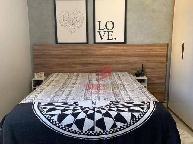 Apartamento com 2 dormitórios à venda, 68 m² por R$ 570.000,00 Aparecida Santos/SP