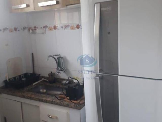Apartamento com 2 dormitórios à venda, 60 m² por R$ 330.000,00 Ocian Praia Grande/SP