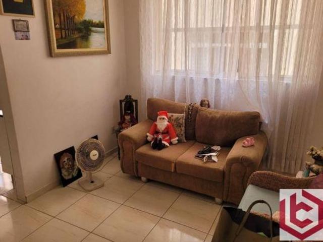 Apartamento com 2 dormitórios à venda, 60 m² por R$ 370.000,00 Boqueirão Santos/SP