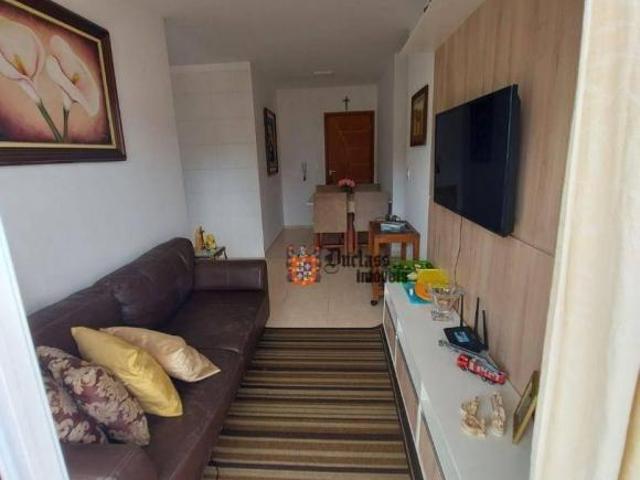 Apartamento com 2 dormitórios à venda, 60 m² por R$ 485.000 Canto do Forte Praia Grande/SP