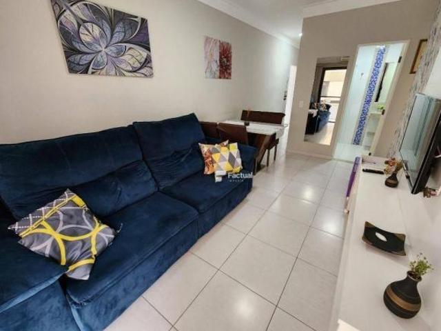 Apartamento com 2 dormitórios à venda, 61 m² por R$ 395.000,00 Enseada Guarujá/SP