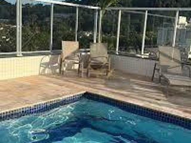 Apartamento com 2 dormitórios à venda, 61 m² por R$ 650.000 Praia das Toninhas Ubatuba/SP