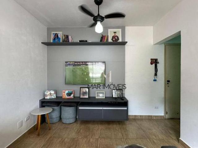 Apartamento com 2 dormitórios à venda, 62 m² por R$ 365.000,00 Asturias Guarujá/SP