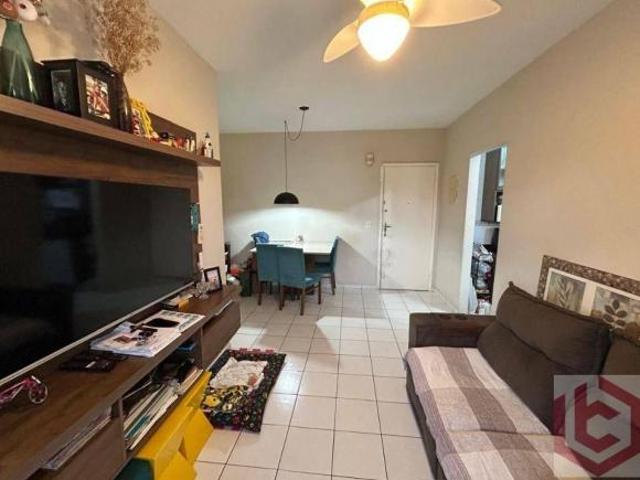 Apartamento com 2 dormitórios à venda, 63 m² por R$ 520.000,00 Estuário Santos/SP