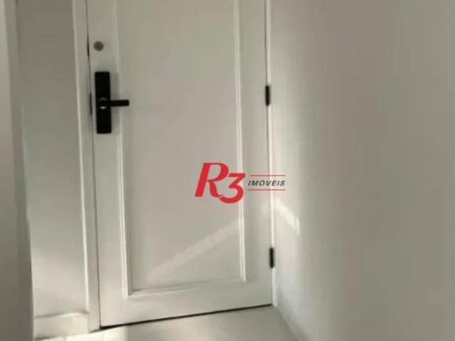Apartamento com 2 dormitórios à venda, 74 m² por R$ 310.000,00 Saboó Santos/SP