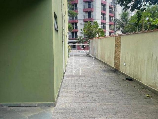 Apartamento com 2 dormitórios à venda, 75 m² por R$ 430.000,00 Praia do Tombo Guarujá/SP