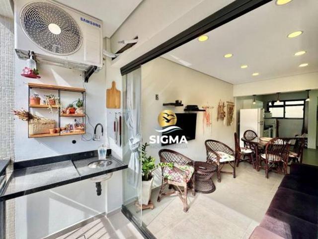 Apartamento com 2 dormitórios à venda, 75 m² por R$ 600.000,00 Praia do Tombo Guarujá/SP