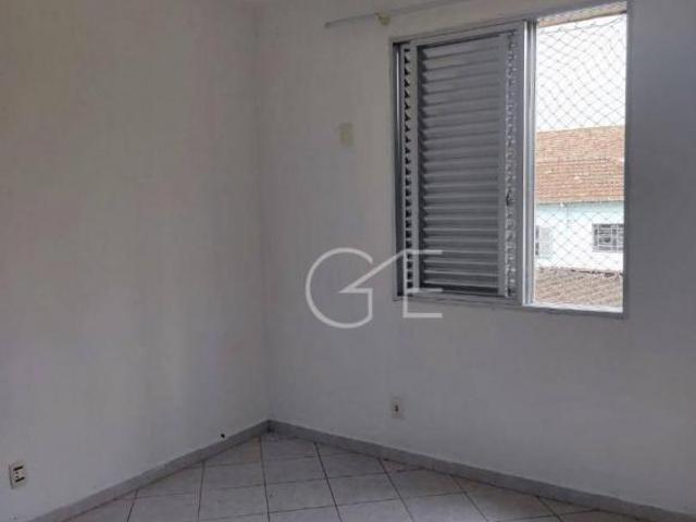 Apartamento com 2 dormitórios à venda, 77 m² por R$ 300.000,00 Estuário Santos/SP