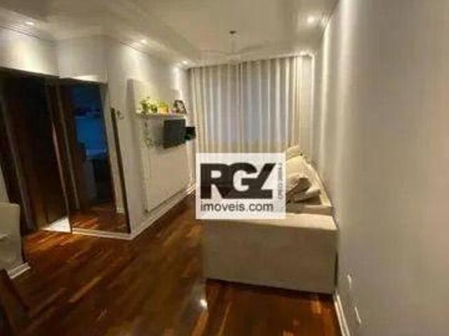 Apartamento com 2 dormitórios à venda, 70 m² por R$ 381.000,00 Aparecida Santos/SP