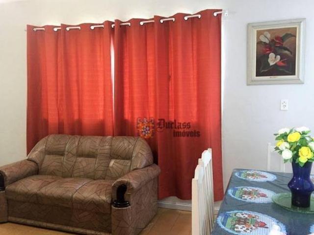 Apartamento com 2 dormitórios à venda, 70 m² por R$ 400.000 Mirim Praia Grande/SP