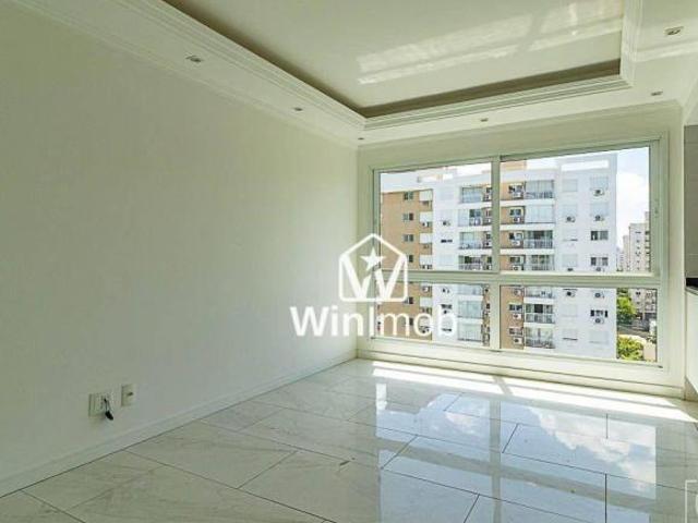 Apartamento com 2 dormitórios à venda, 70 m² por R$ 600.000,00 Passo d&apos Areia Porto Alegre/RS
