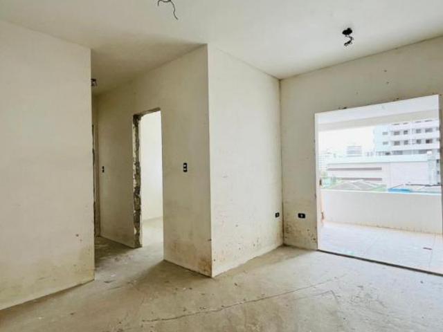 Apartamento com 2 dormitórios à venda, 72 m² por R$ 500.000,00 Caiçara Praia Grande/SP