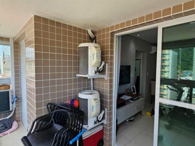 Apartamento com 2 dormitórios à venda, 72 m² por R$ 620.000,00 Canto do Forte Praia Grande/SP